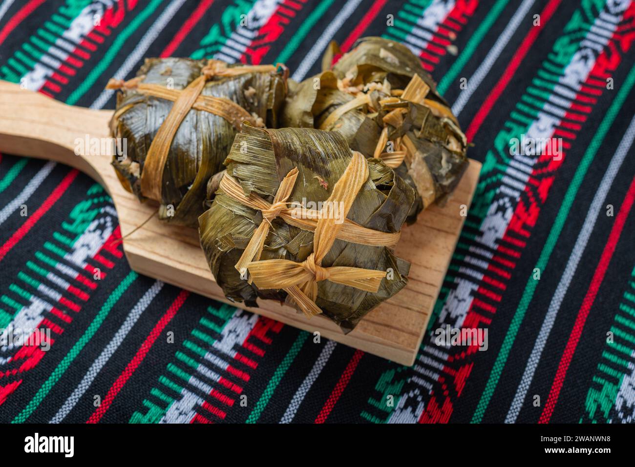 Ash tamales on a tablecloth with the colors of the Mexican flag Stock ...