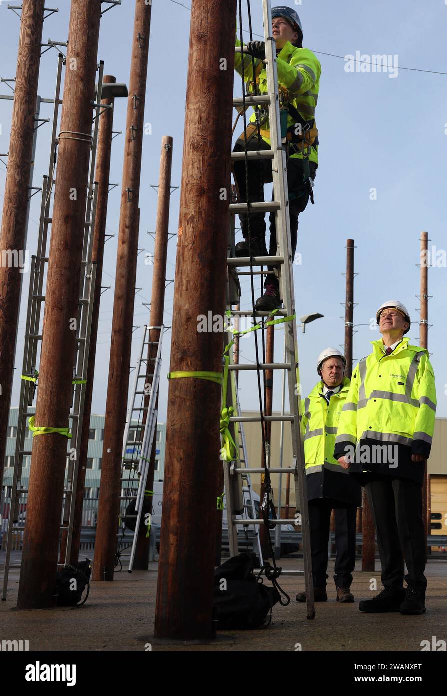 Chancellor of the Exchequer Jeremy Hunt watches a demonstration of how ...