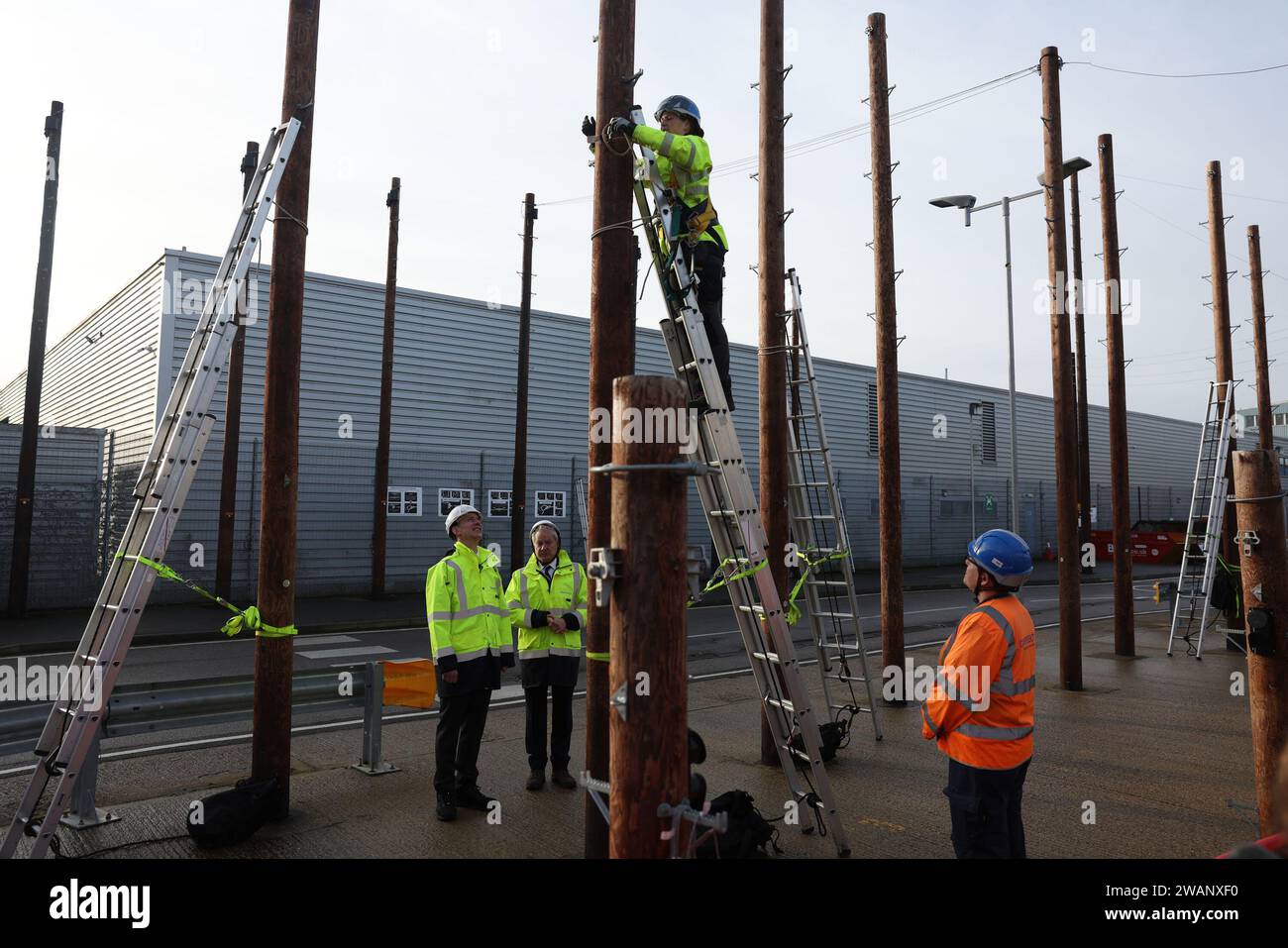 Chancellor of the Exchequer Jeremy Hunt watches a demonstration of how ...