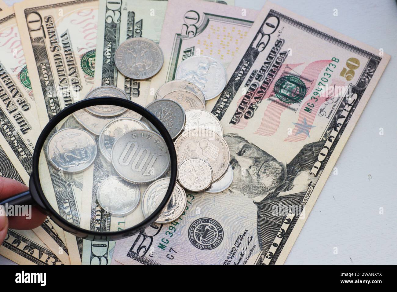 Default in Russia and strengthening of ruble. Hand with magnifying ...