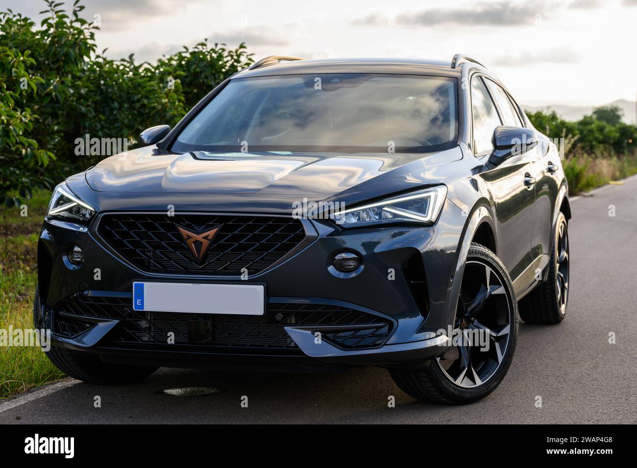 Spanish CUPRA car model Formentor in an outdoor session at sunset with ...