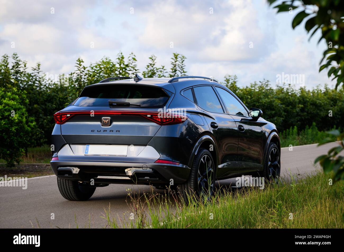 Spanish CUPRA car model Formentor in an outdoor session at sunset with ...