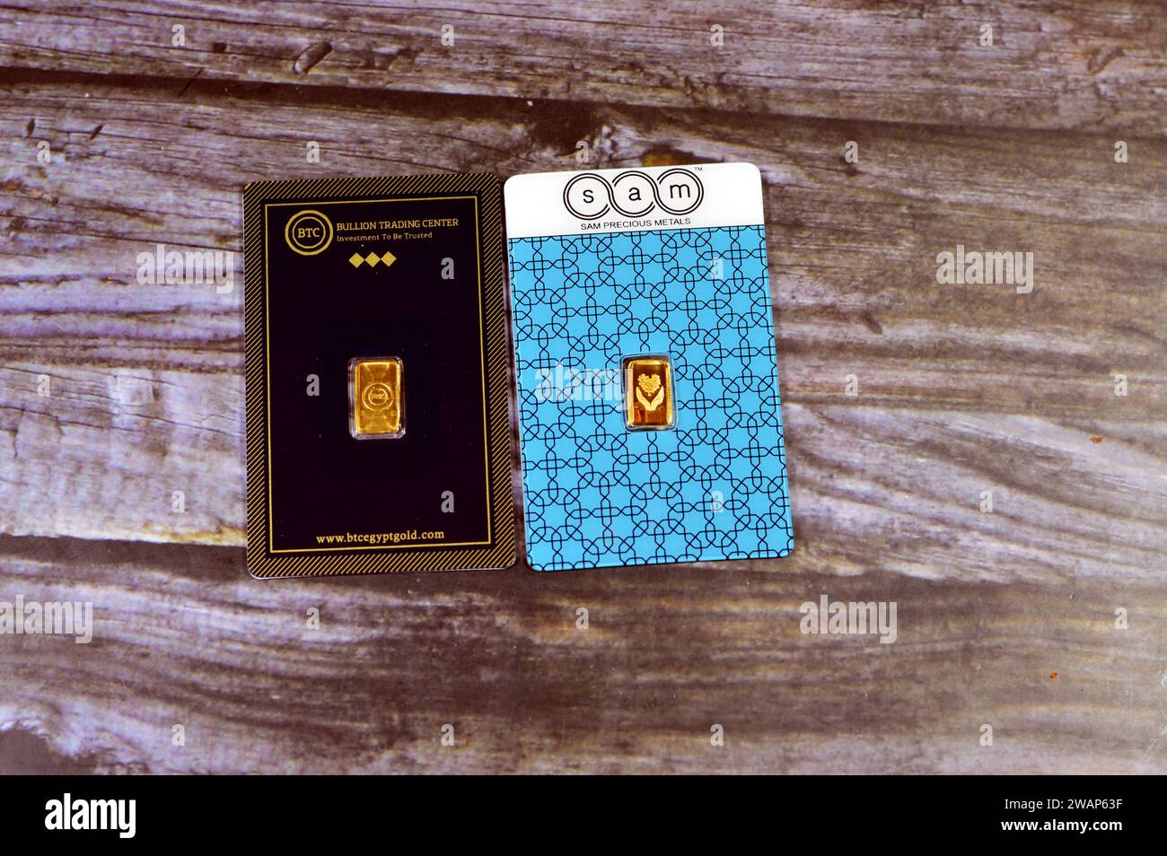 Cairo, Egypt, January 2 2024: BTC Bullion Trading Center and SAM precious metal 24K karat pure ...