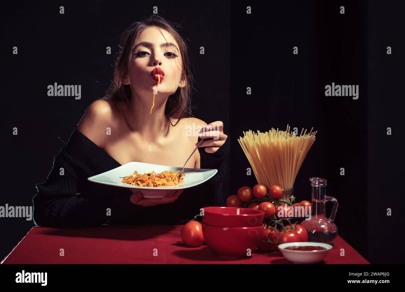 Sensual woman eat spaghetti. Italian girl eats spaghetti pasta Stock ...