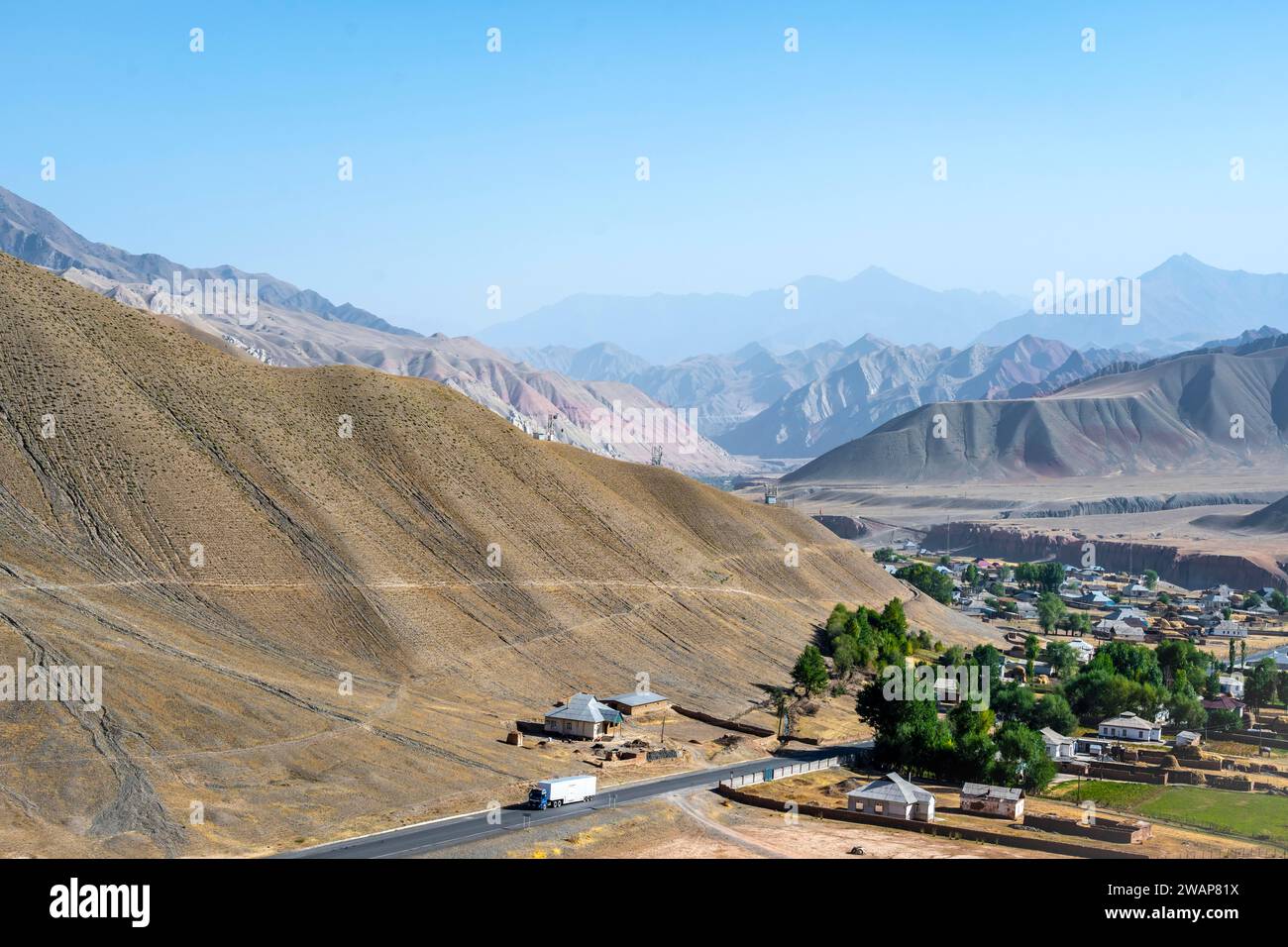 City of Toktogul, road through desert landscape, Kyrgyzstan, Asia Stock ...
