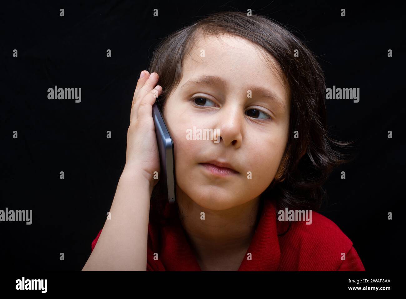 Little boy hold smartphone as modern mobile communication gadget Stock ...