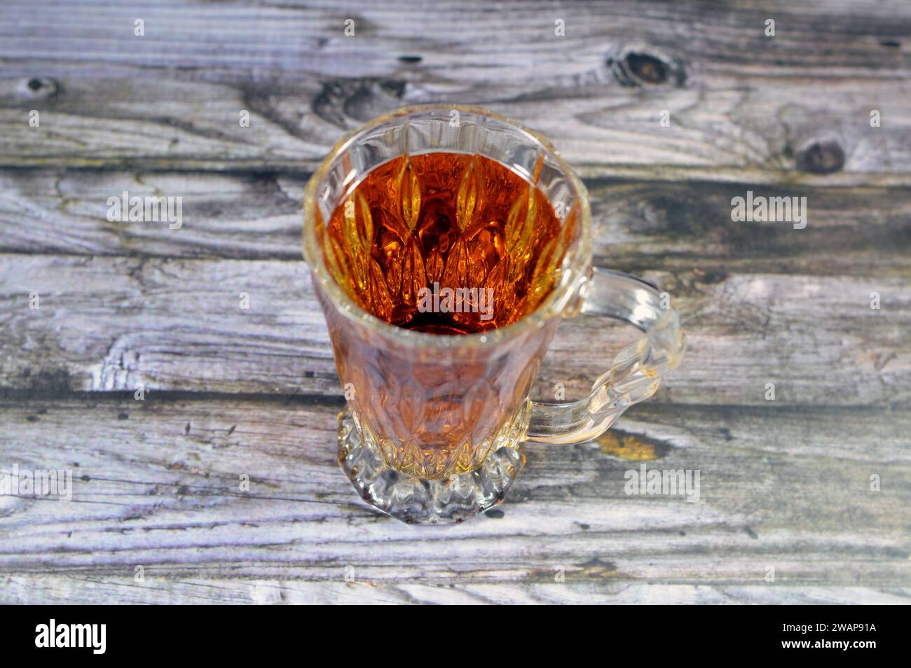 Apple juice, a fruit juice made by the maceration and pressing of an ...