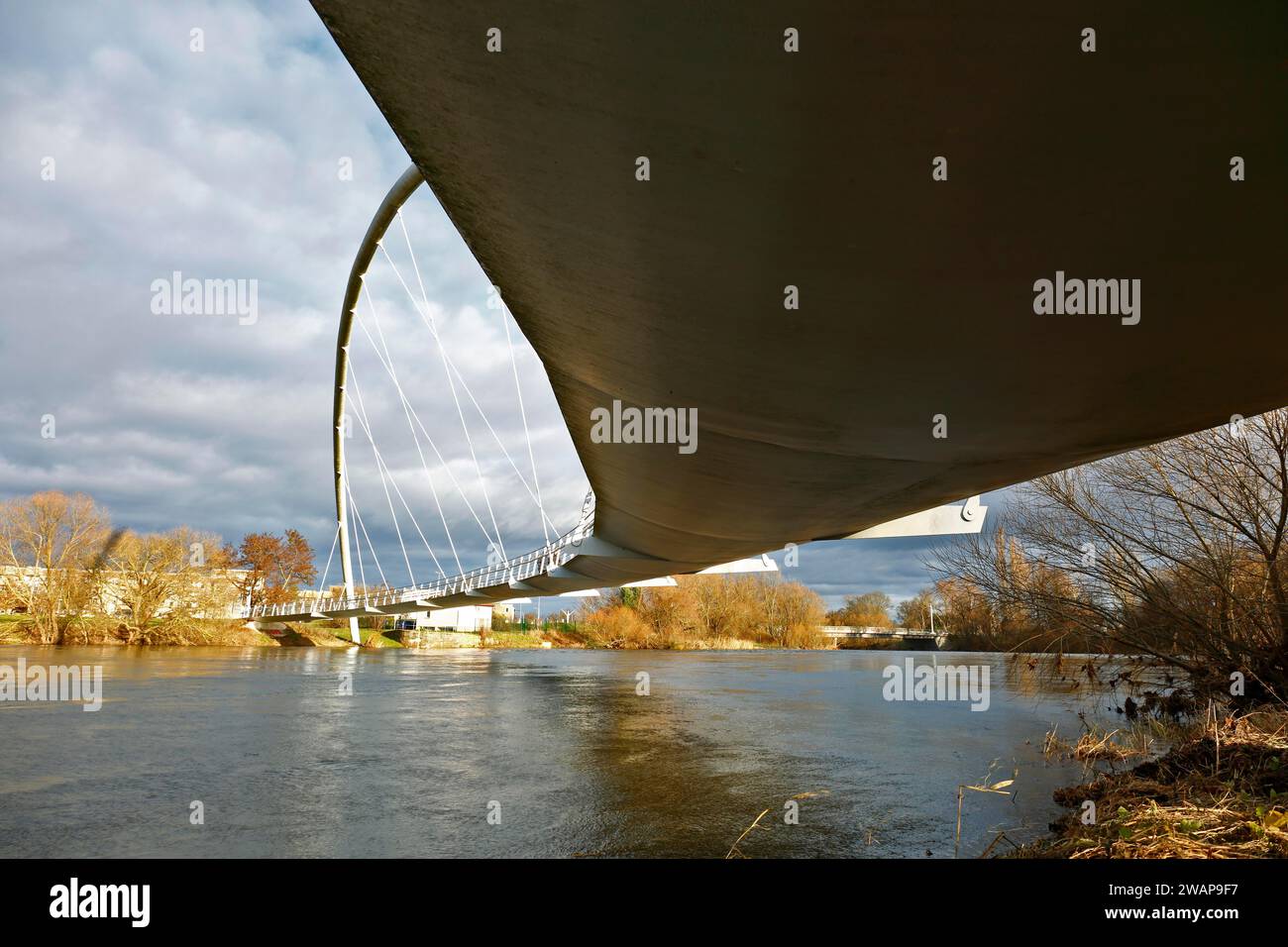 Cantilever pedestrian bridge over the River Mulde near Dessau, arch ...