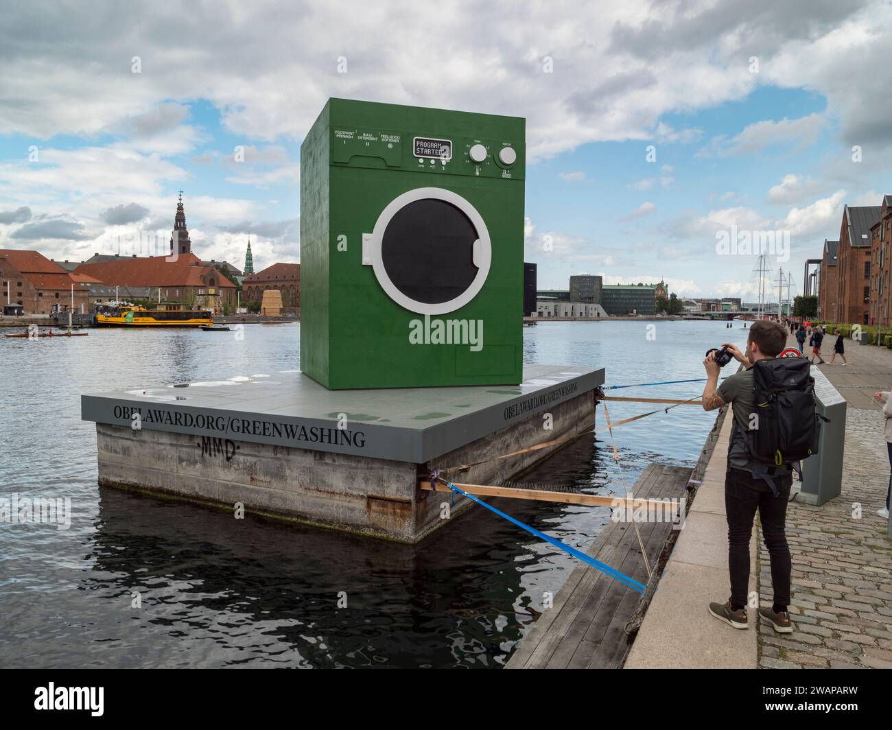 A giant green washing machine by the Mast studio, caricaturing the ...