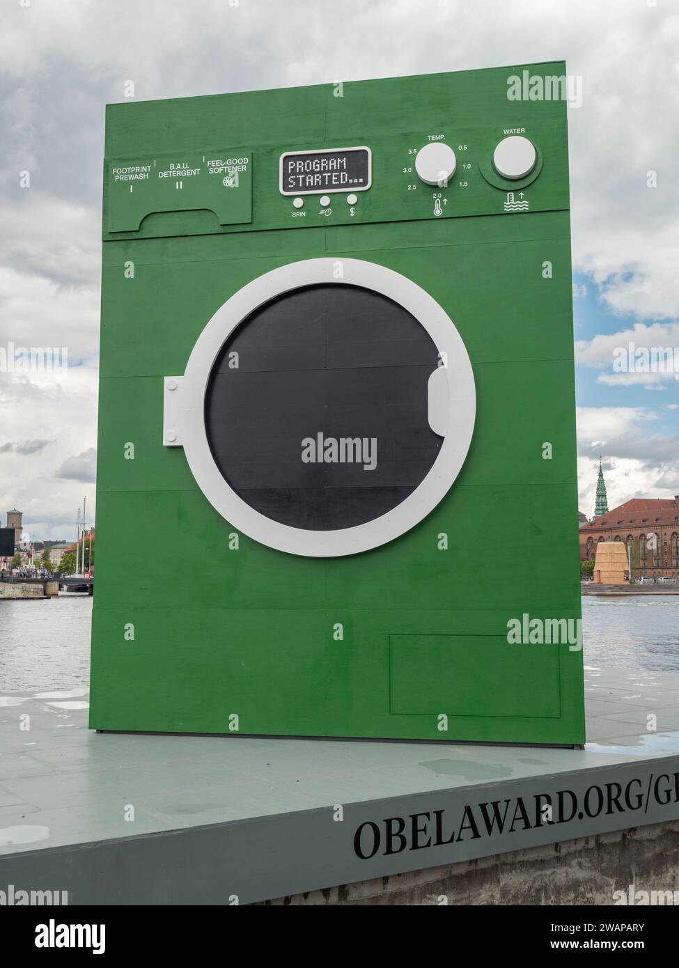 A giant green washing machine by the Mast studio, caricaturing the ...