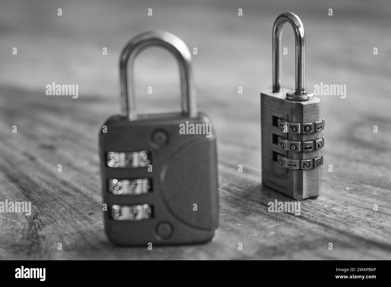 concept of safety with two combination lock on a wooden table Stock ...