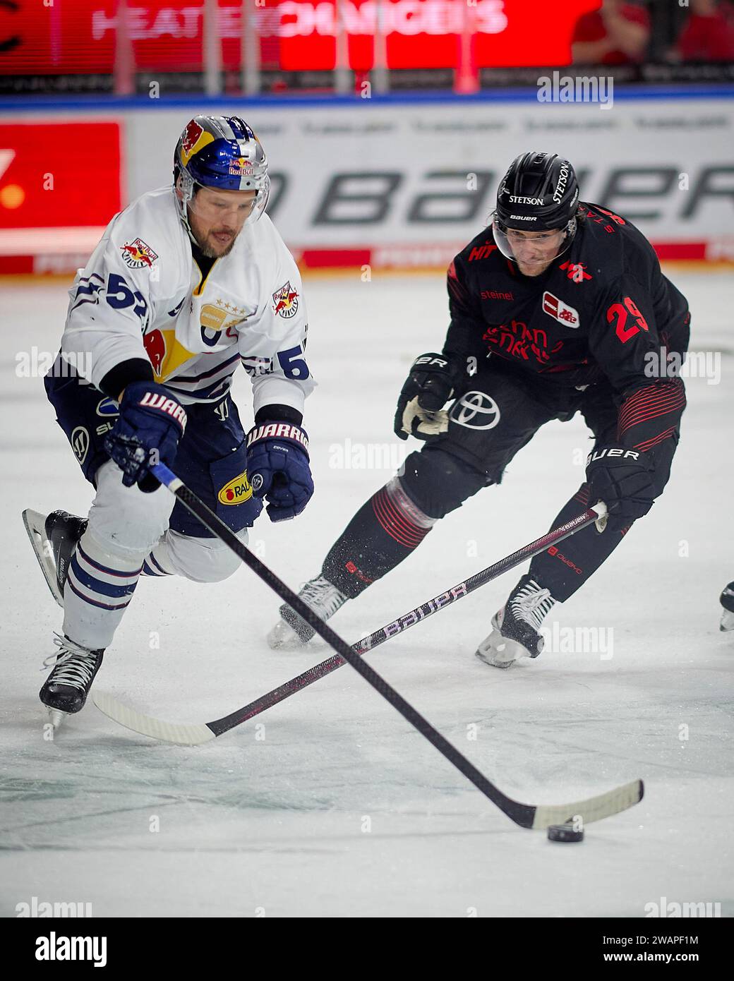 COLOGNE, GERMANY - 5 JANUARY, 2024: Patrick Hager, Andrej Sustr, Hockey ...