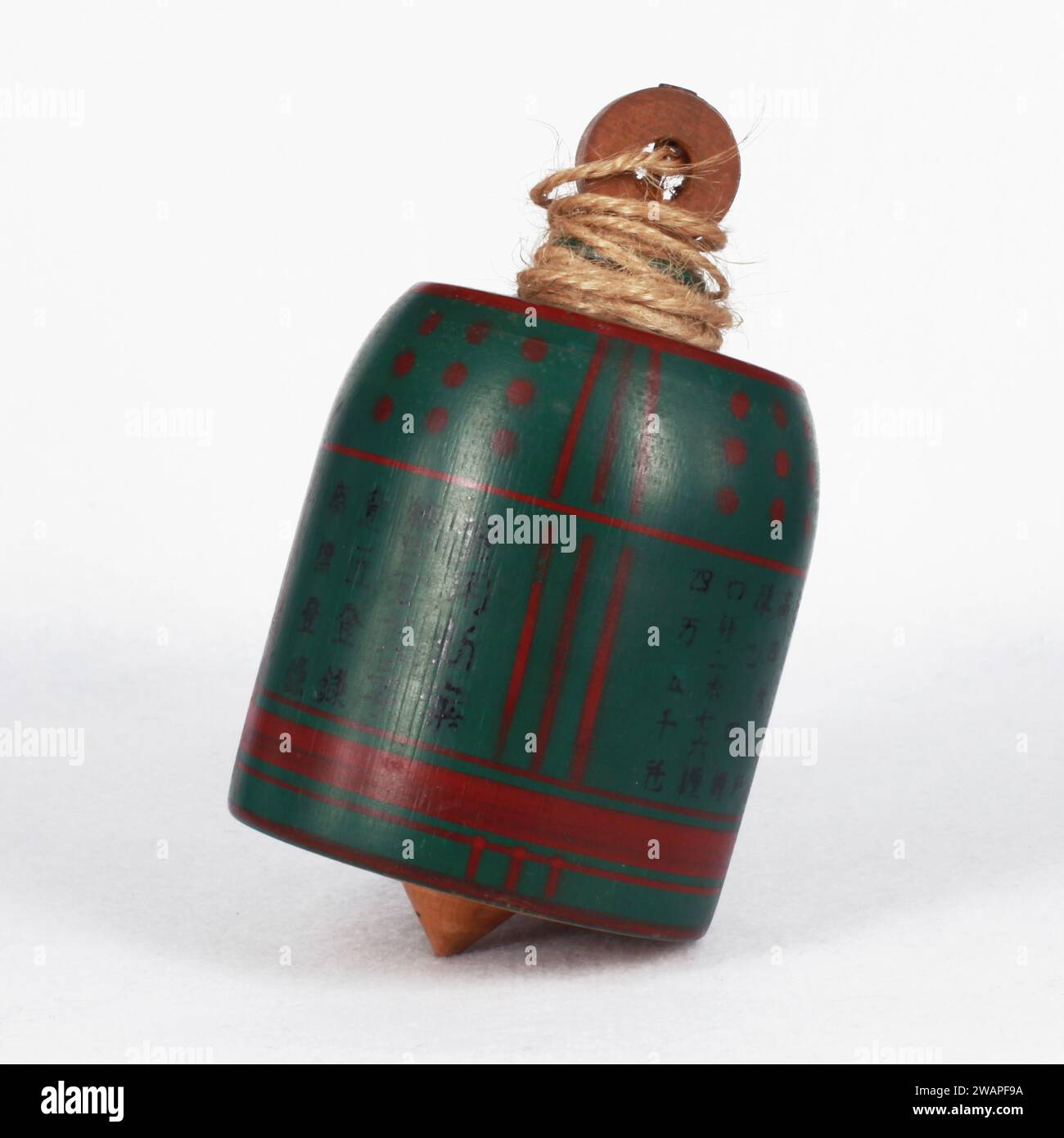 Spinning string tops hi-res stock photography and images - Alamy