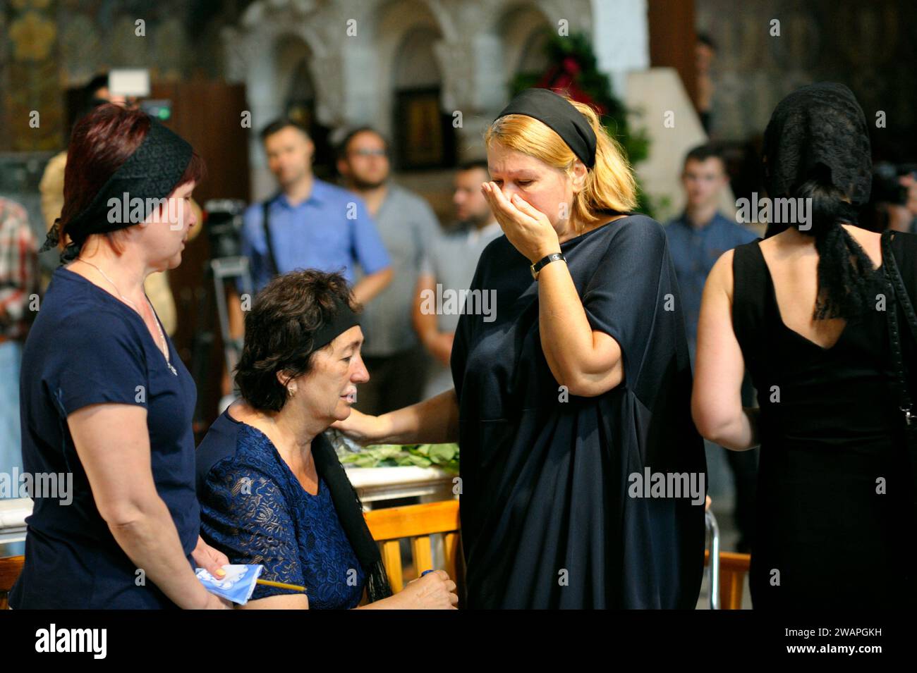 Funeral death ceremony mourning widow hi-res stock photography and ...