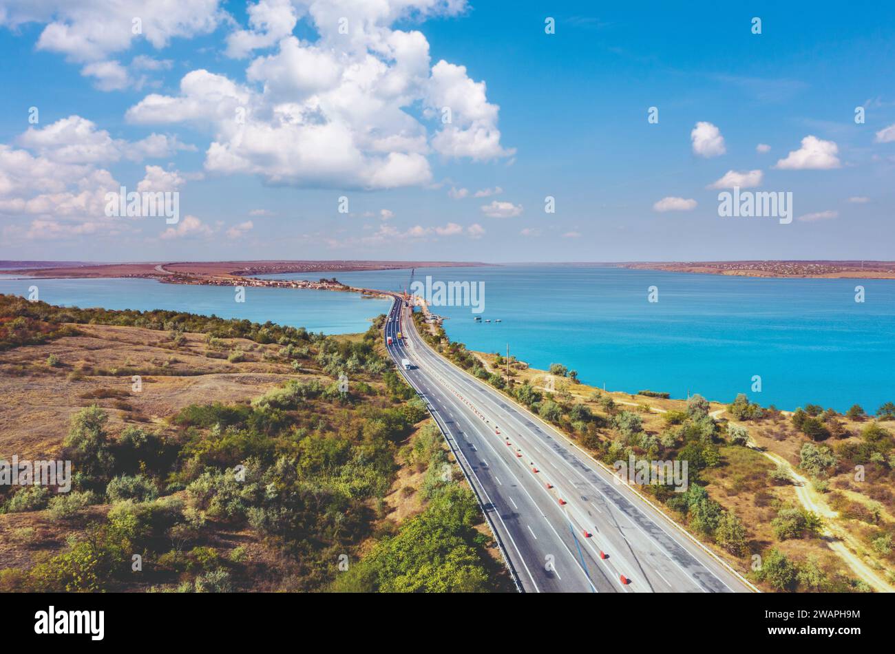 View from above of highway and rod bridge over Khadzhibey Estuary ...