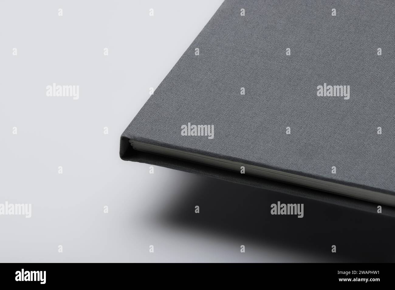 Empty grey floating book mockup. Studio shot of a blank closed book ...