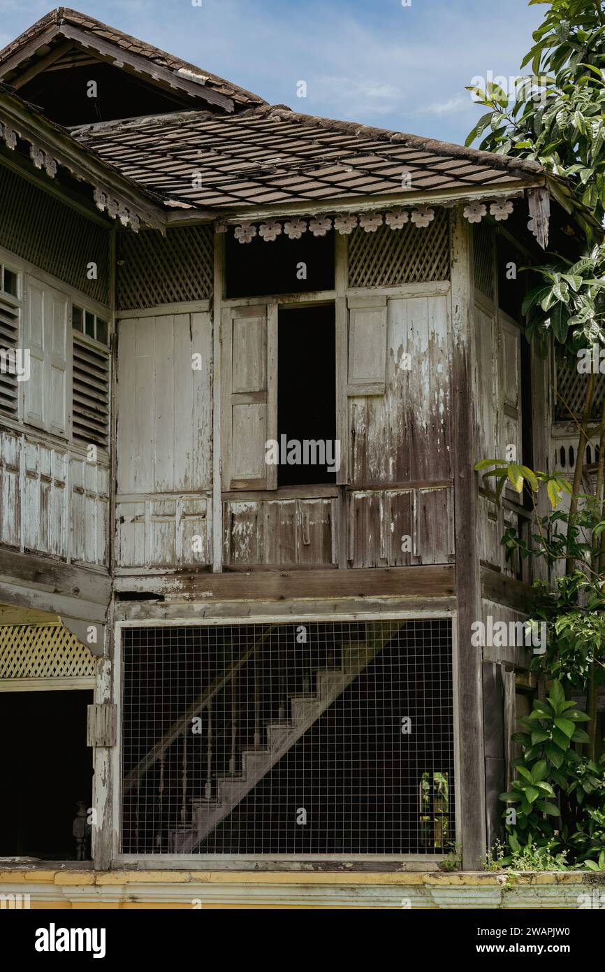 Old weathered wooden house built in 1912 in Kuala Kangsar, Perak ...