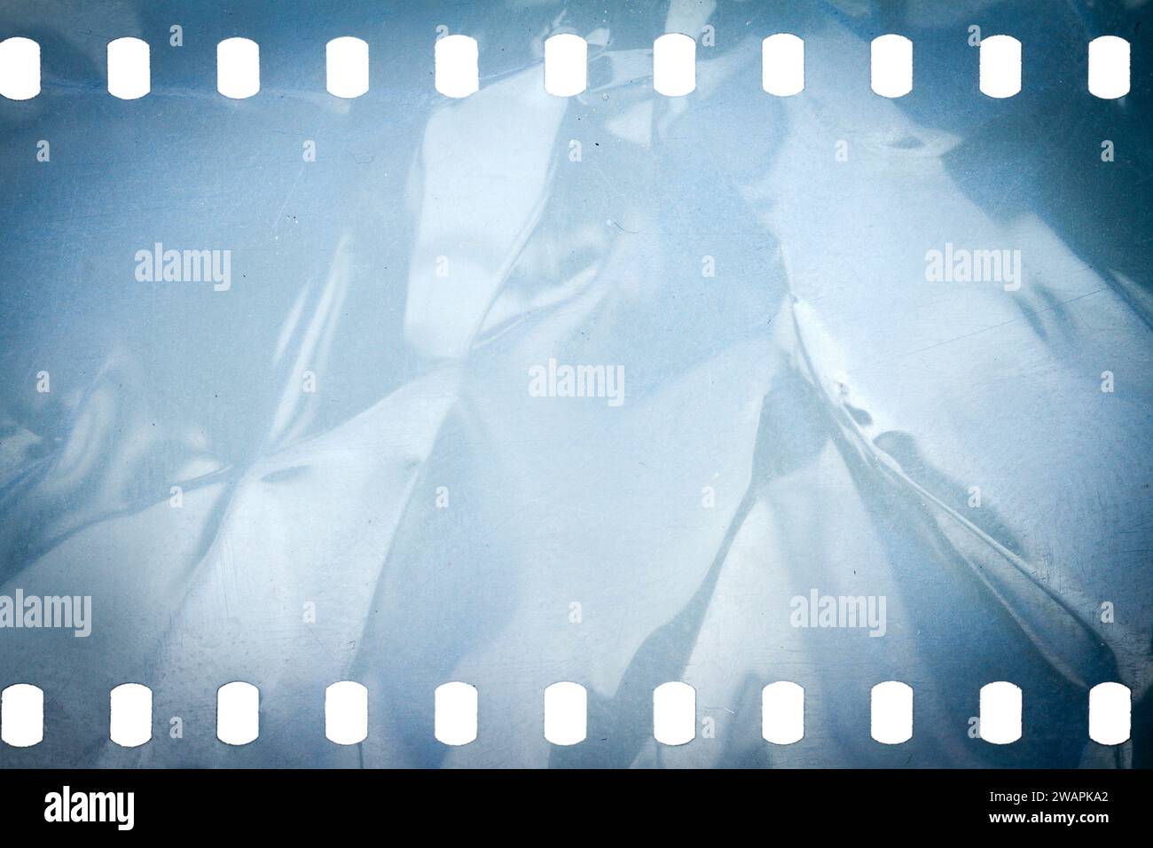 Dusty and grungy 35mm film texture or surface. Perforated scratched ...