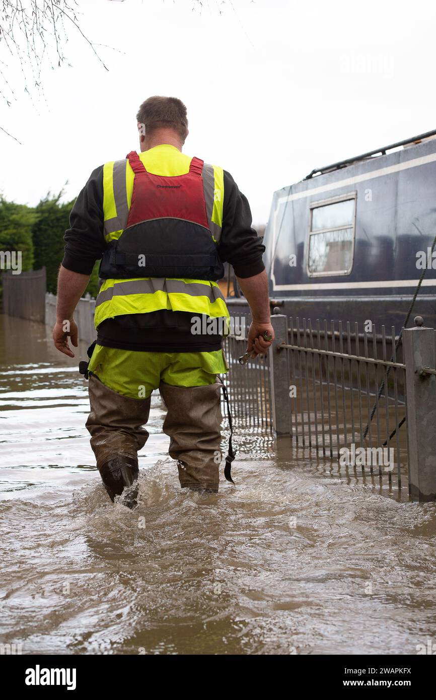 Working in water wearing waders hi-res stock photography and images - Alamy