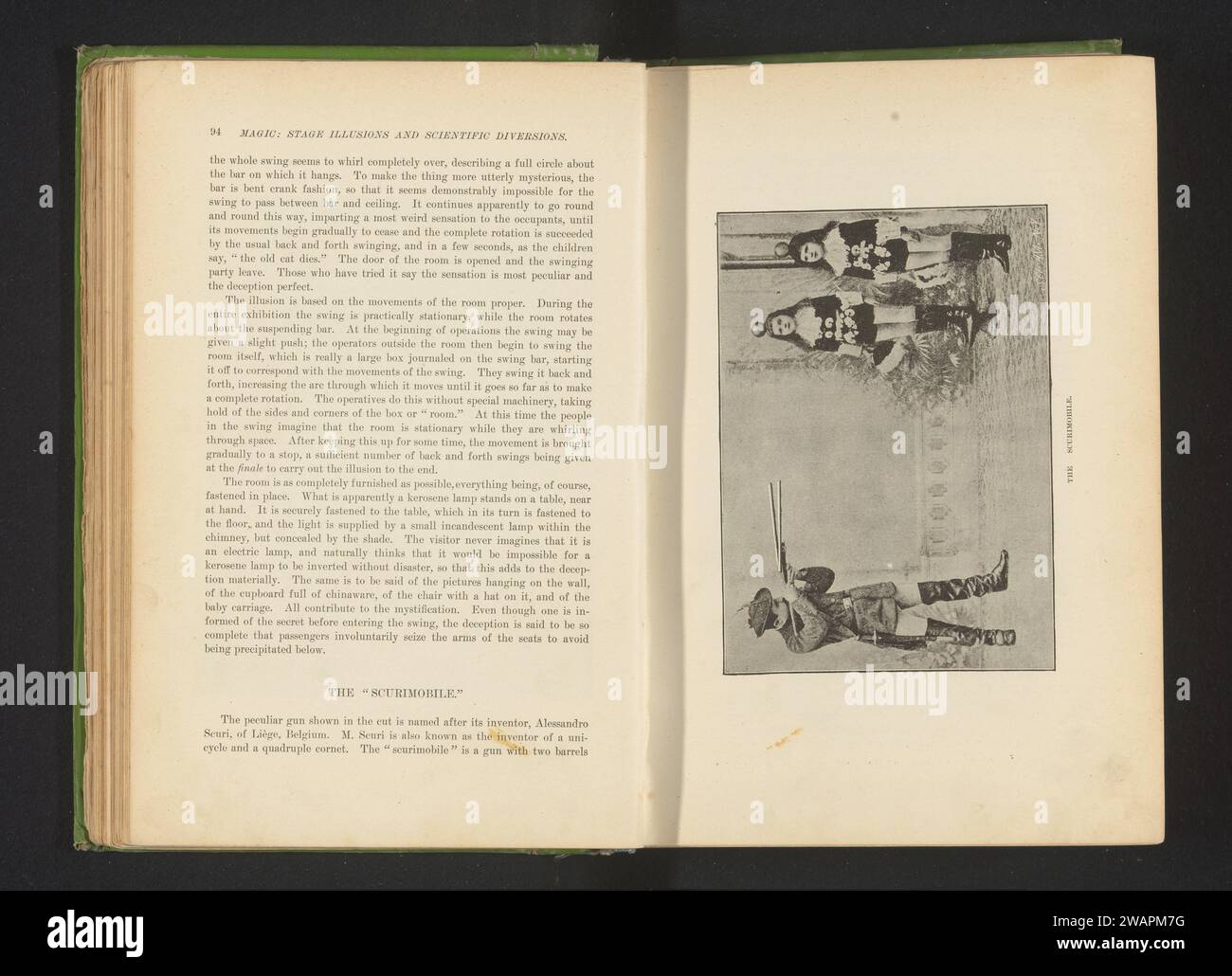 Man in costume focuses a gun on two girls with an apple on their heads ...