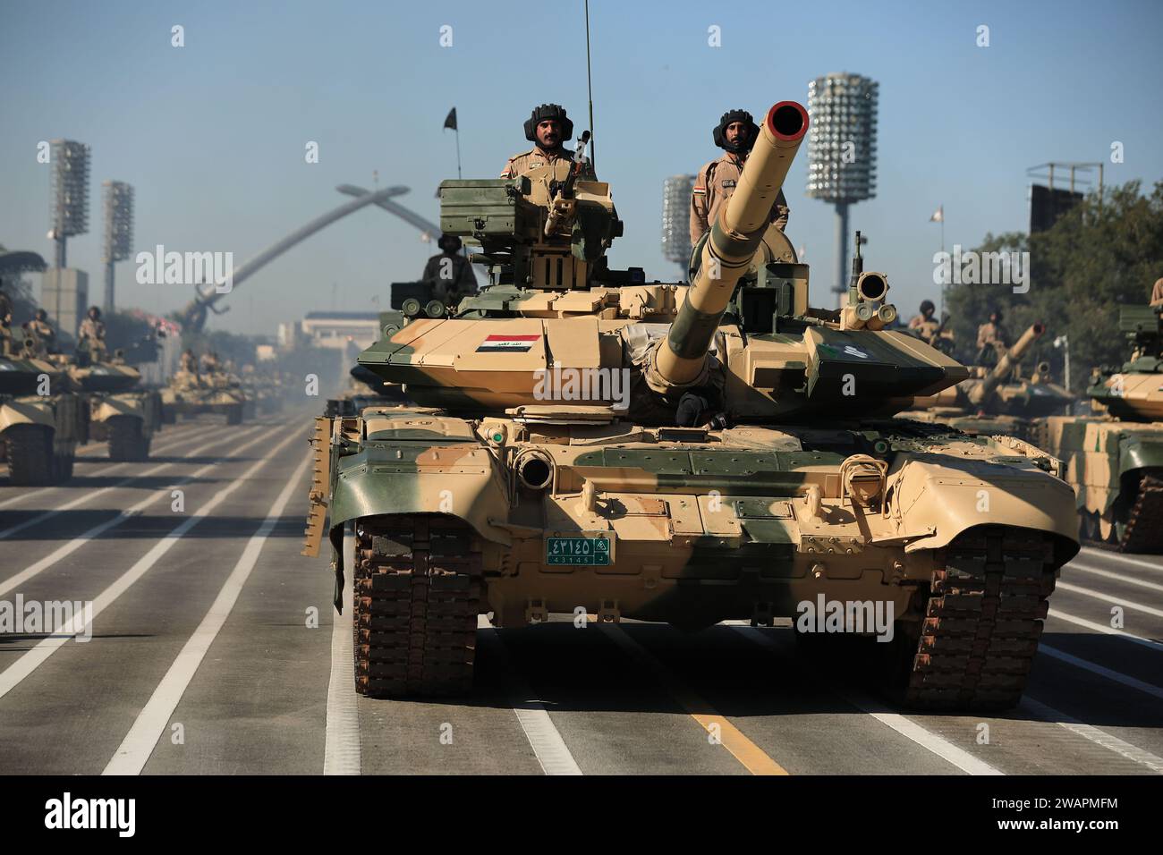 Baghdad, Iraq. 06th Jan, 2024. Soldiers on tanks take part in a ...