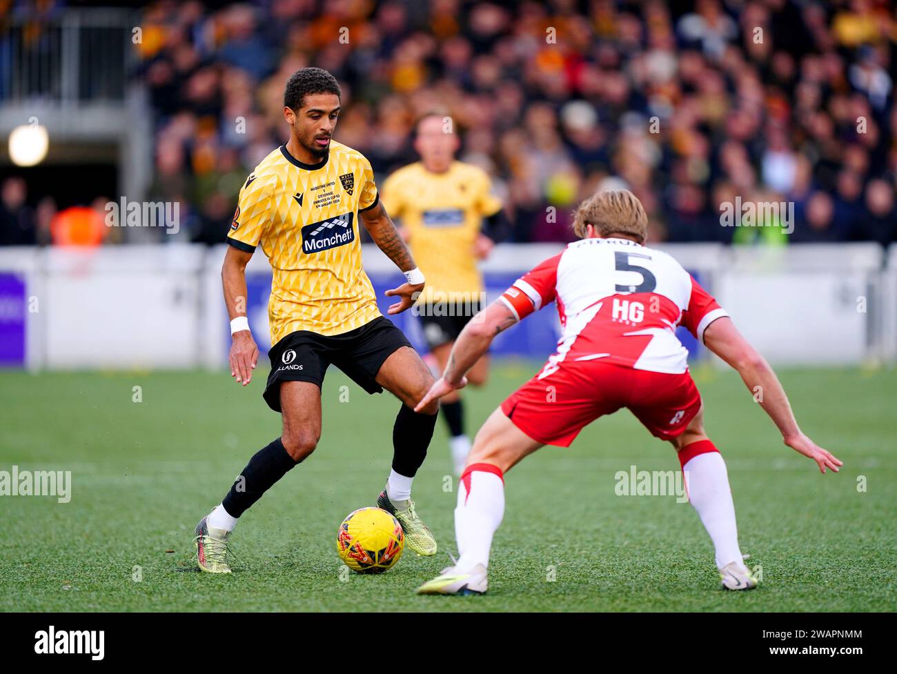 Maidstone United's Liam Sole (left) and Stevenage's Carl Piergianni ...