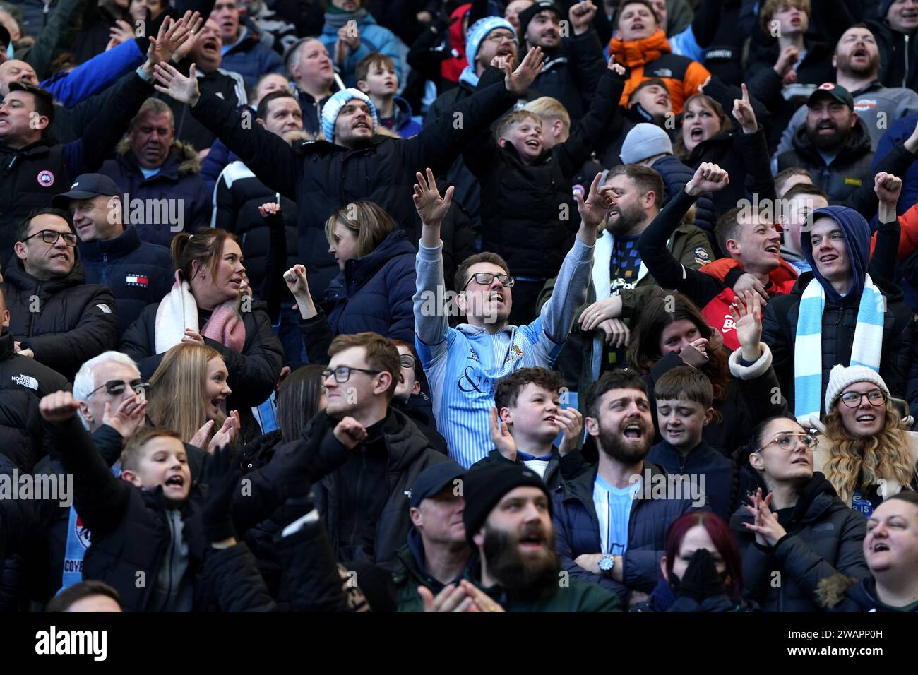 Coventry City fans celebrate their side's first goal of the game ...