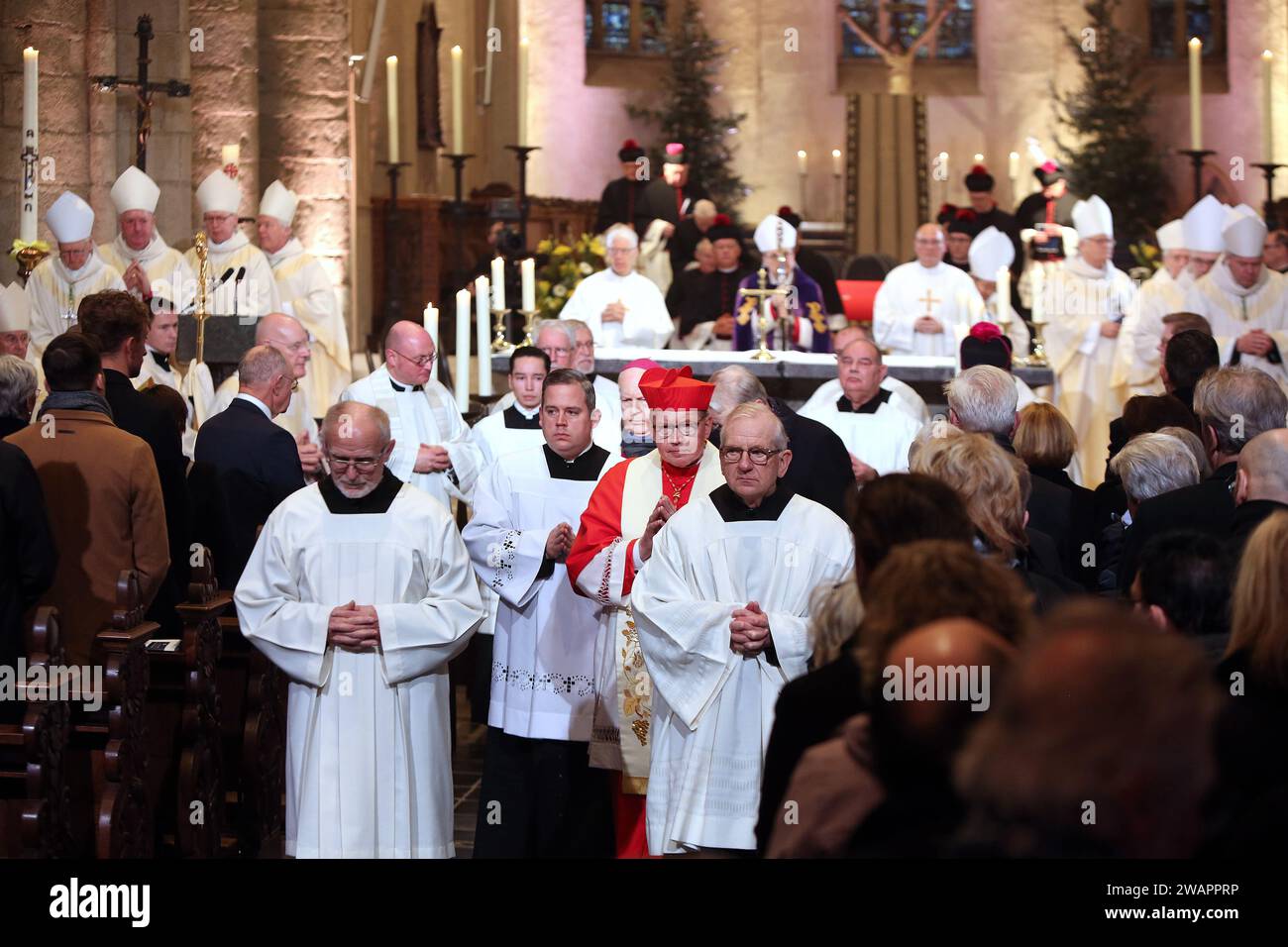 ROERMOND - Cardinal Wim Eijk (M) after the pontifical requim mass in St ...