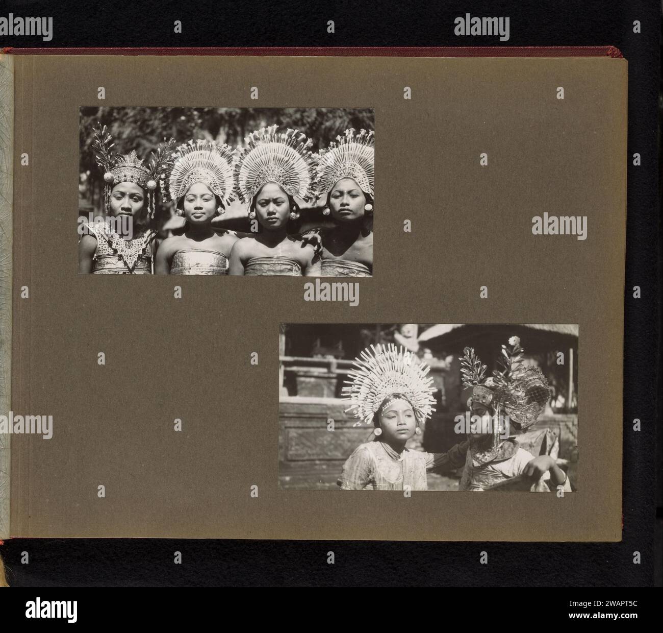 Girls in Indonesian traditional costume and two children perform a ...