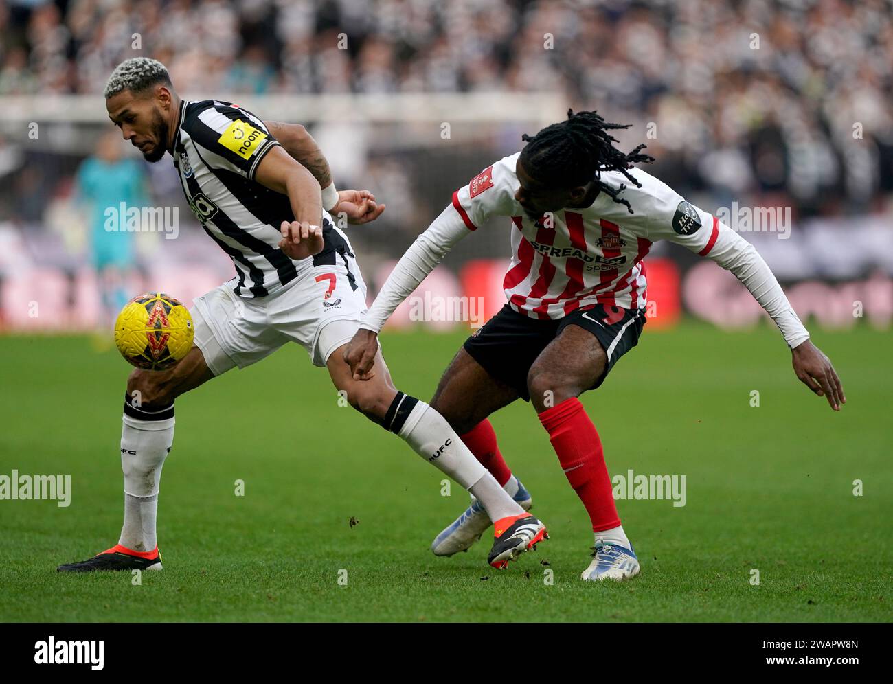 Newcastle United's Joelinton (left) and Sunderland's Pierre Ekwah ...