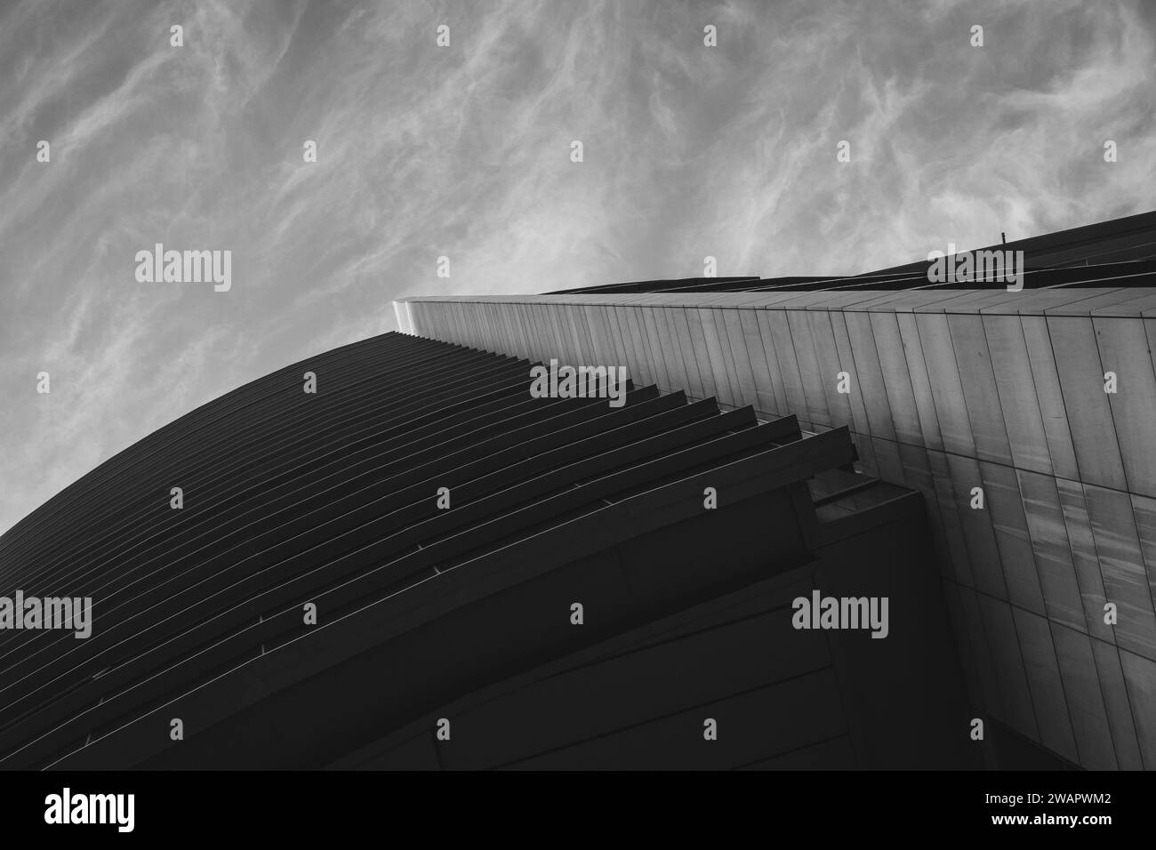 Abstract upward view of a modern buildings sharp lines against a ...