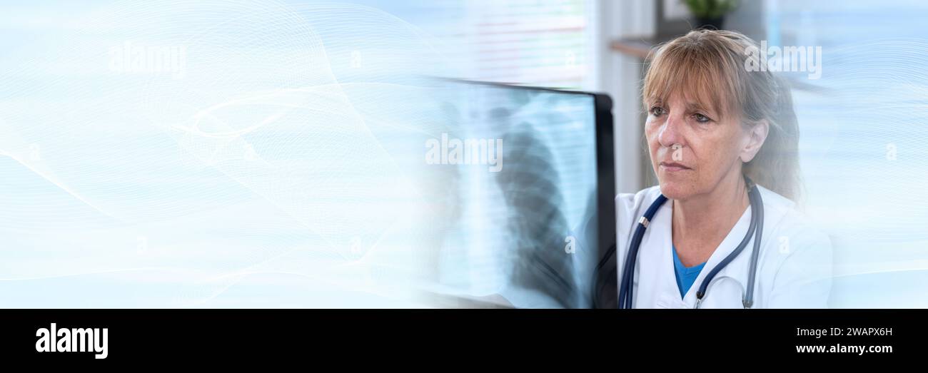 Female doctor looking at x-ray in medical office; panoramic banner ...