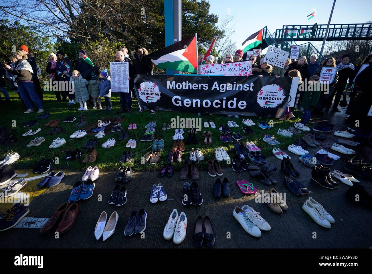 108 pairs of shoes for each journalist killed in Gaza are laid out as ...