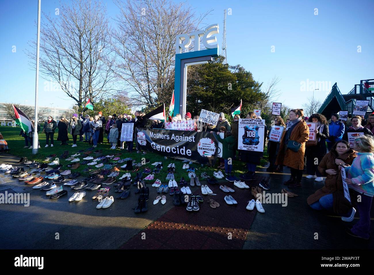 108 pairs of shoes for each journalist killed in Gaza are laid out as ...