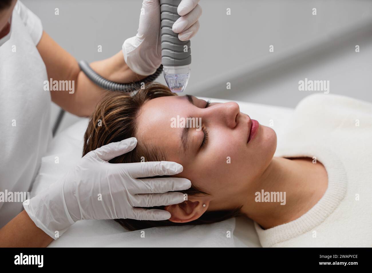 Microneedle RF lifting procedure Stock Photo - Alamy