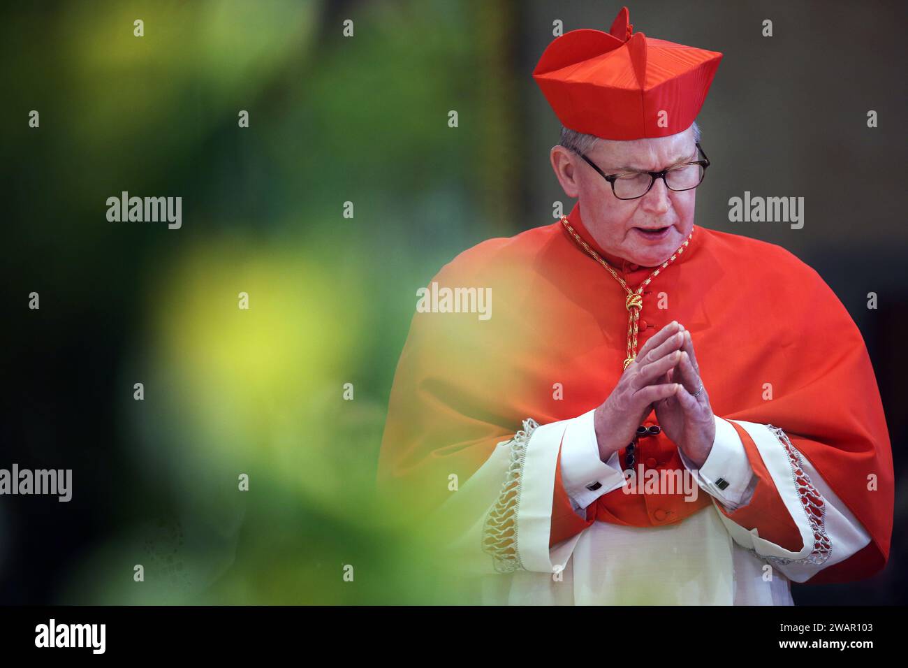 ROERMOND - Cardinal Wim Eijk in prayer during the pontifical requim ...
