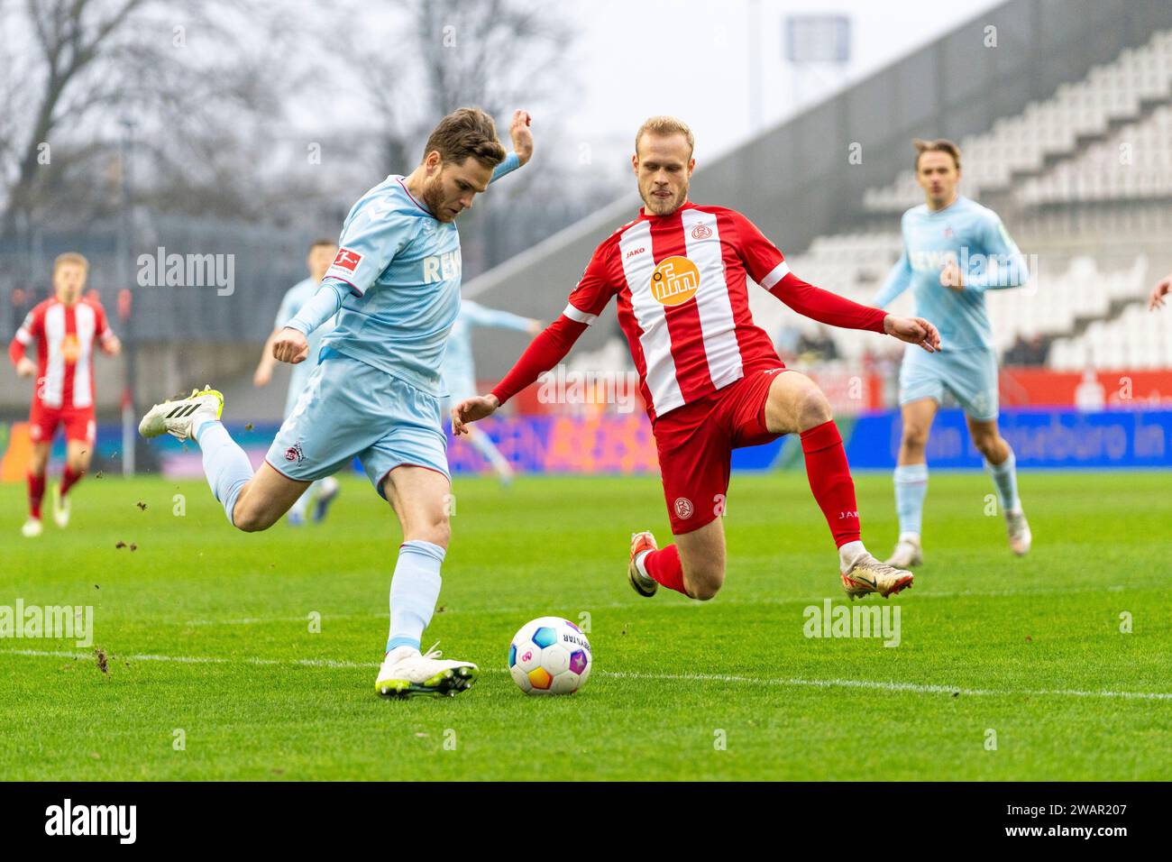 Essen, Deutschland. 14th Jan, 2023. Benno Schmitz (1. FC Koeln, #02), Lucas Brumme (RW Essen ...