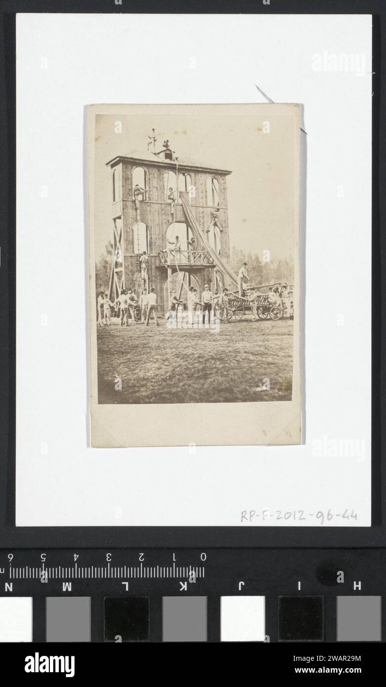 Men at a wooden facade under construction, c. 1860 - c. 1890 photograph ...