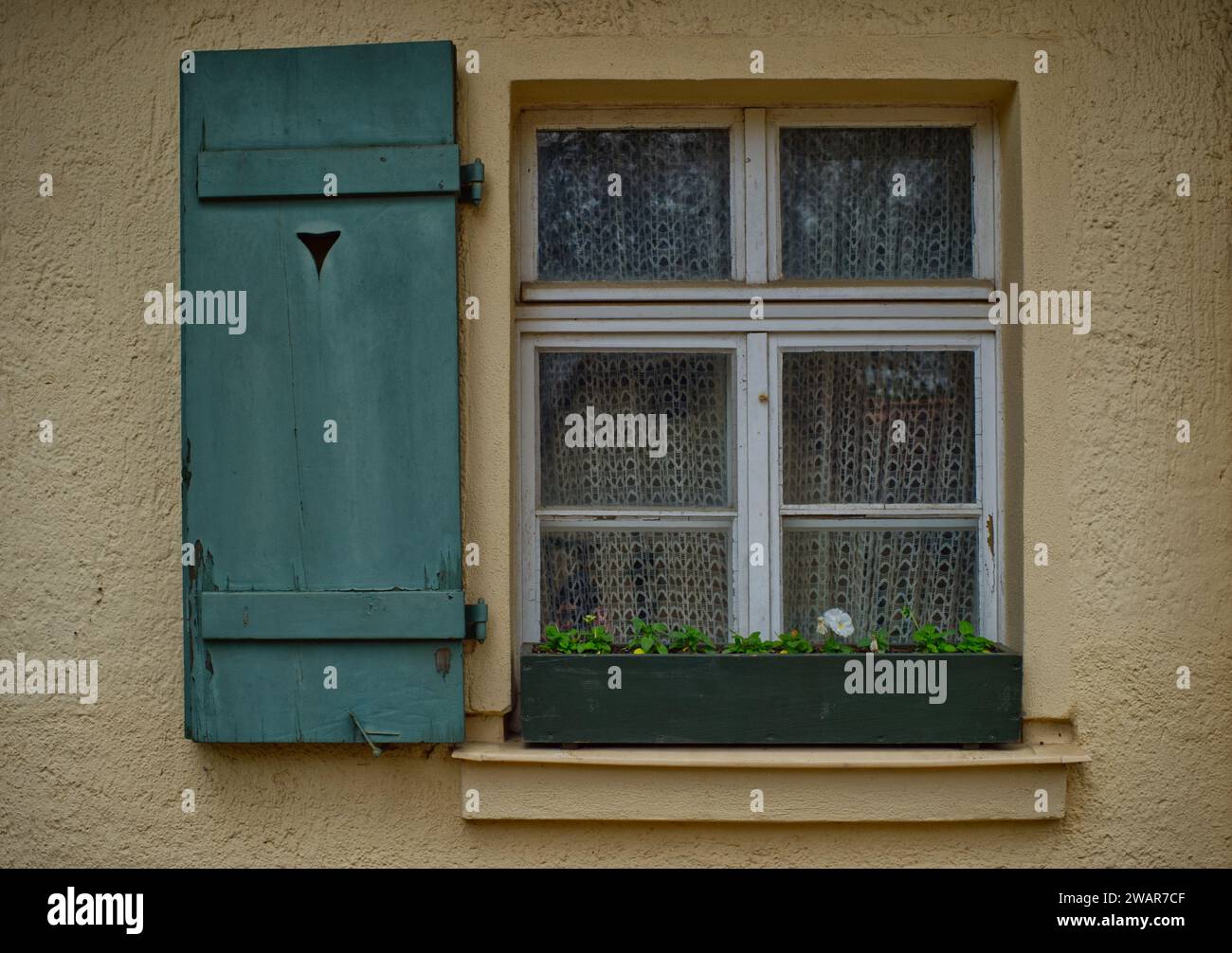 Window of an old farmhouse of the small village ("Dörflein") at the ...