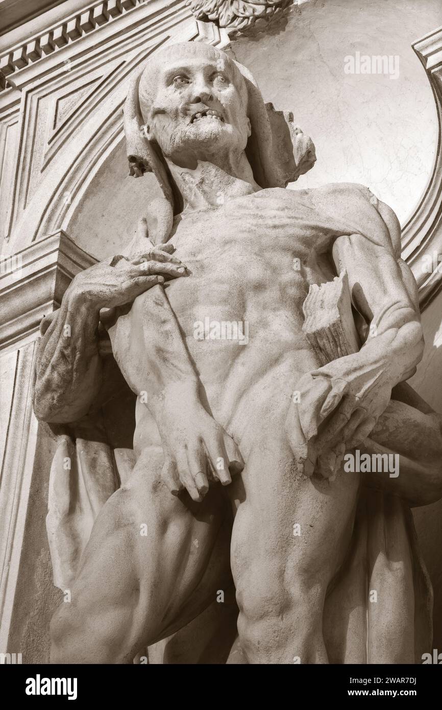 Vicenza - The statue of St. Bartholomew on the facade of church ...
