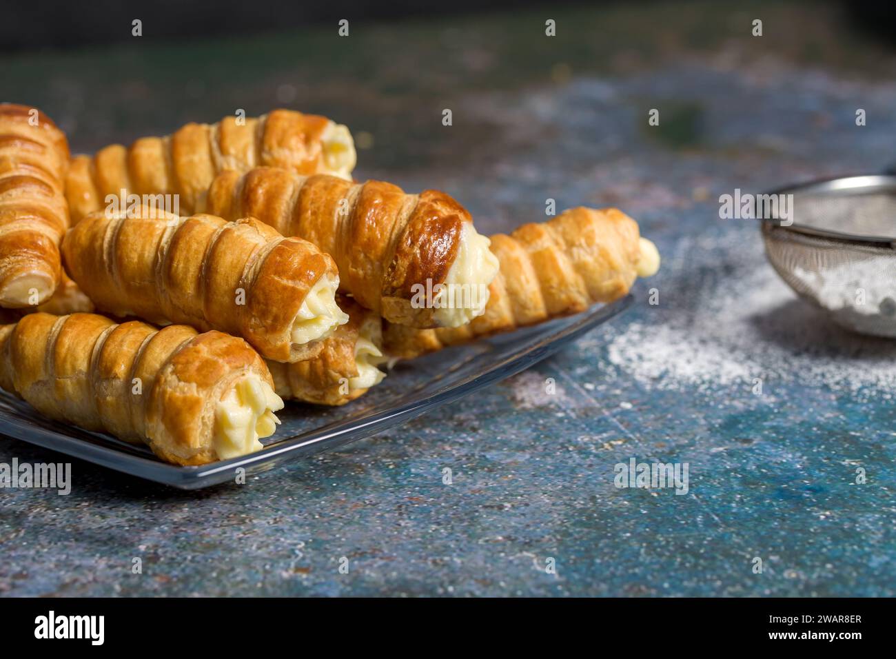 Puff pastry cream horns hi-res stock photography and images - Alamy