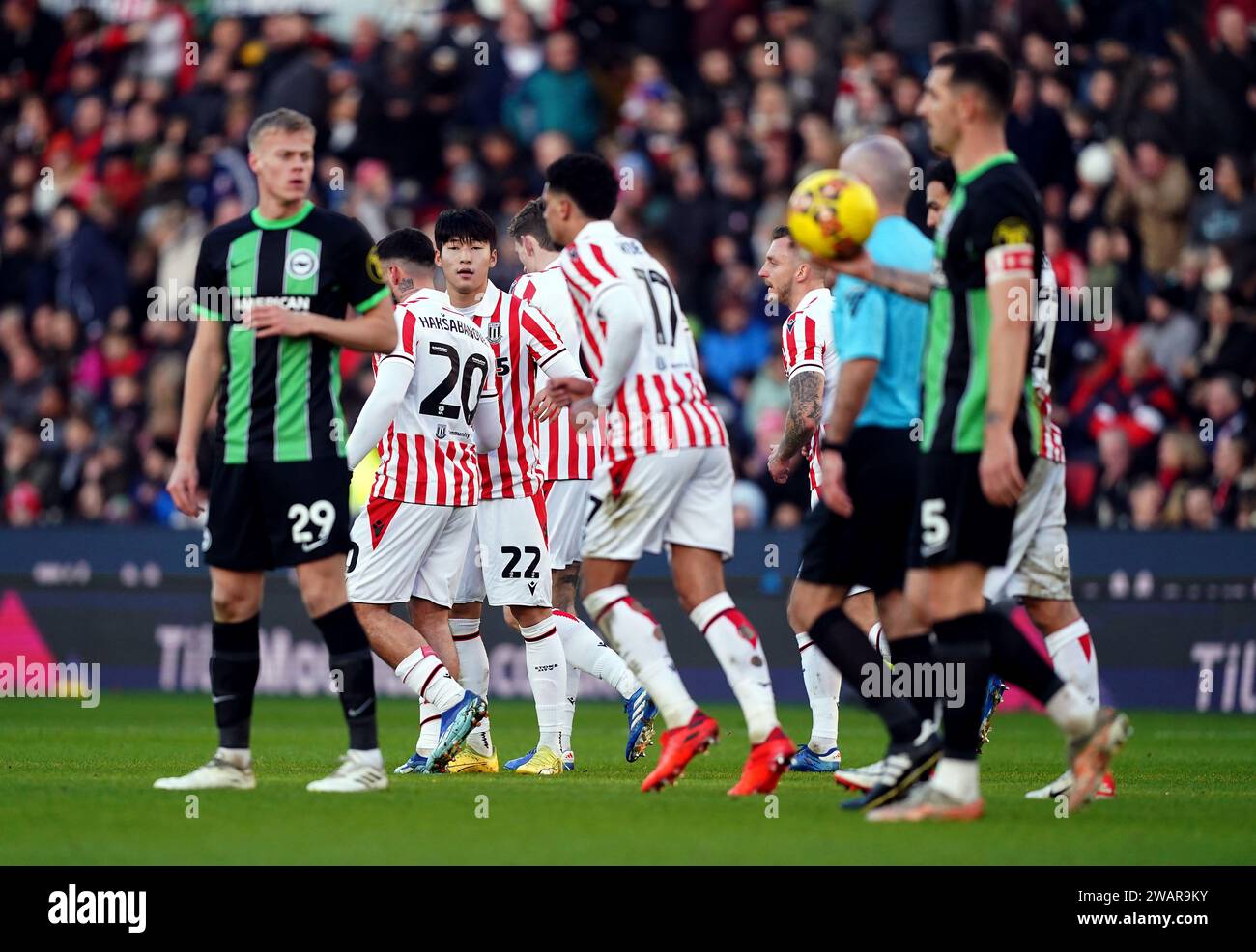Stoke City's Bae Jun-Ho celebrates with team-mates after their first ...