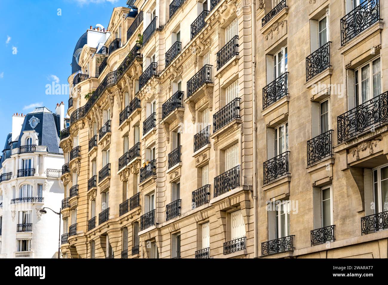 Façade of a typical and elegant residential building in Passy quarter ...
