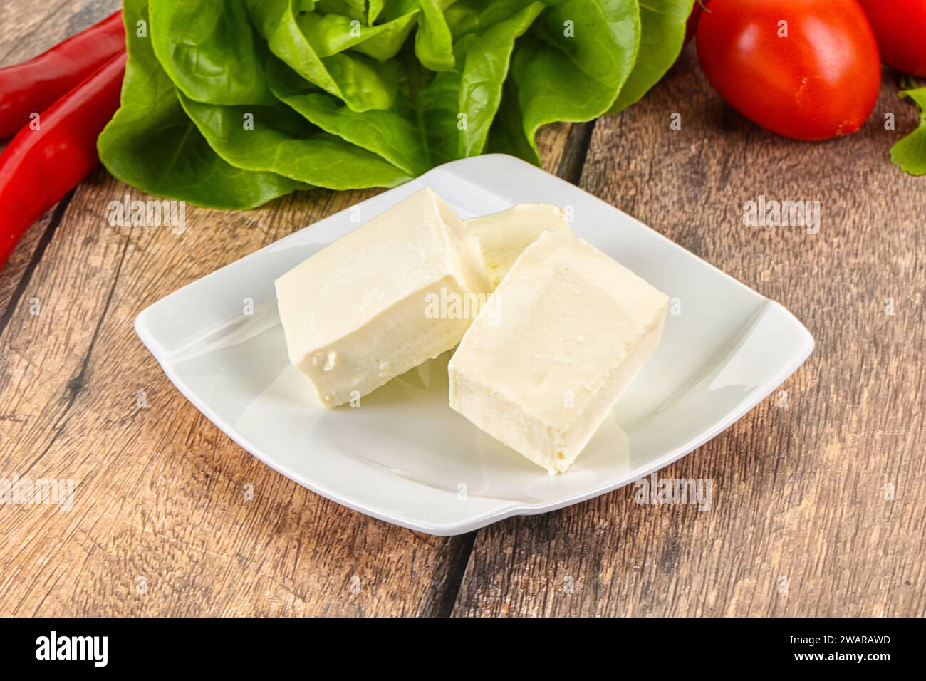 Greek traditional Feta soft cheese in the plate Stock Photo - Alamy