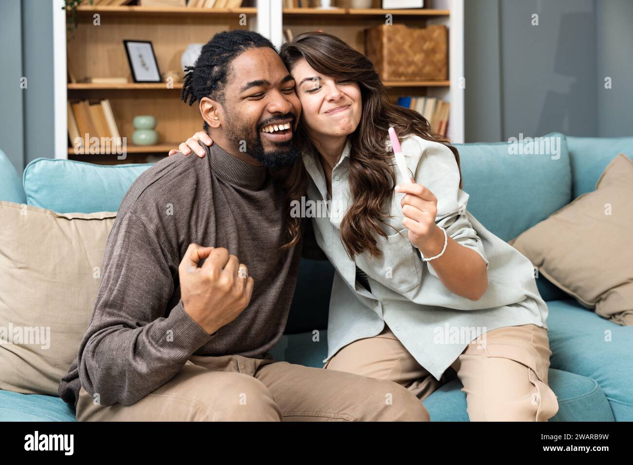 Young married couple two people looking forward to positive pregnancy ...