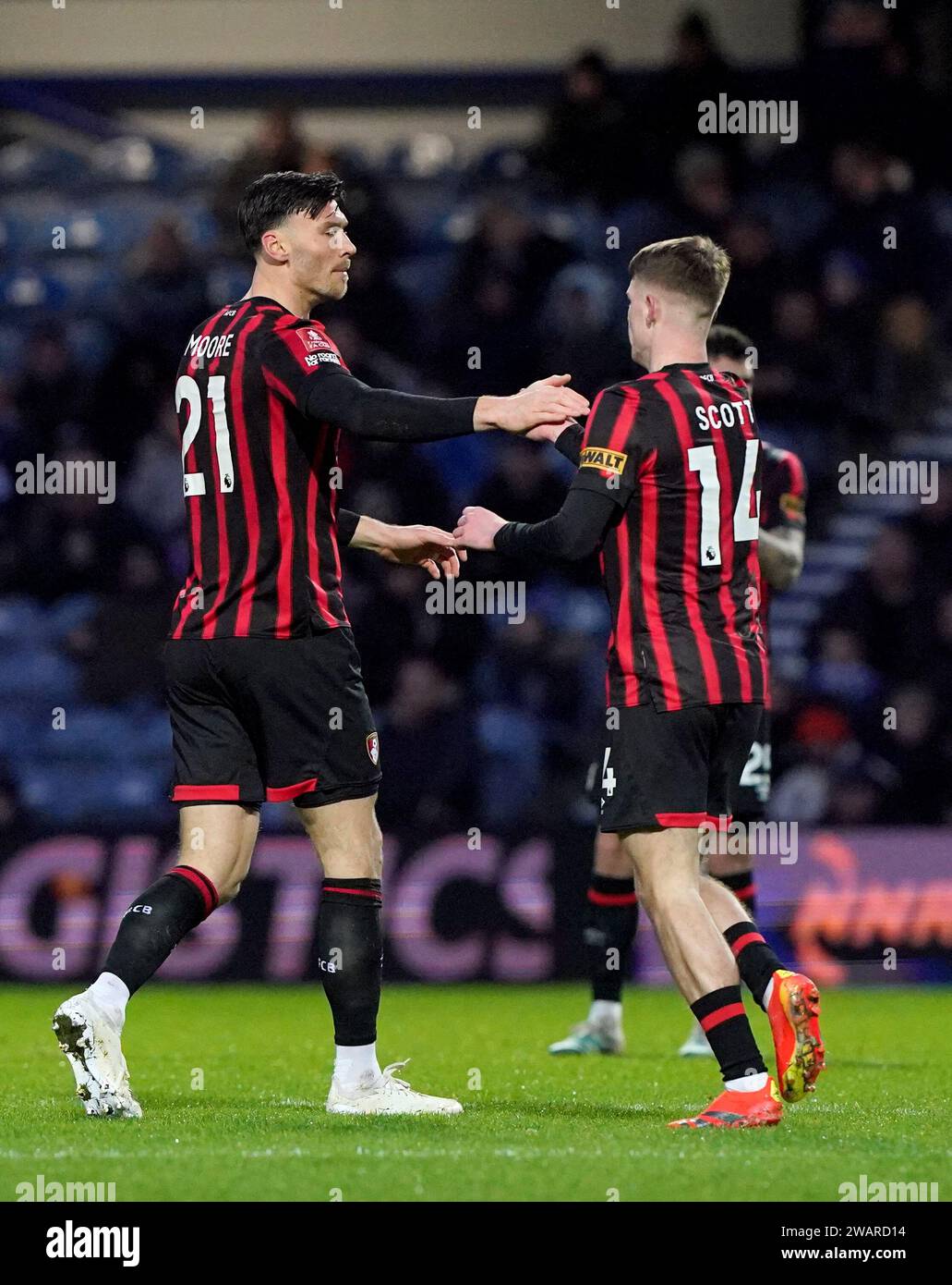 Bournemouth's Kieffer Moore (left) is congratulated by his team mate ...