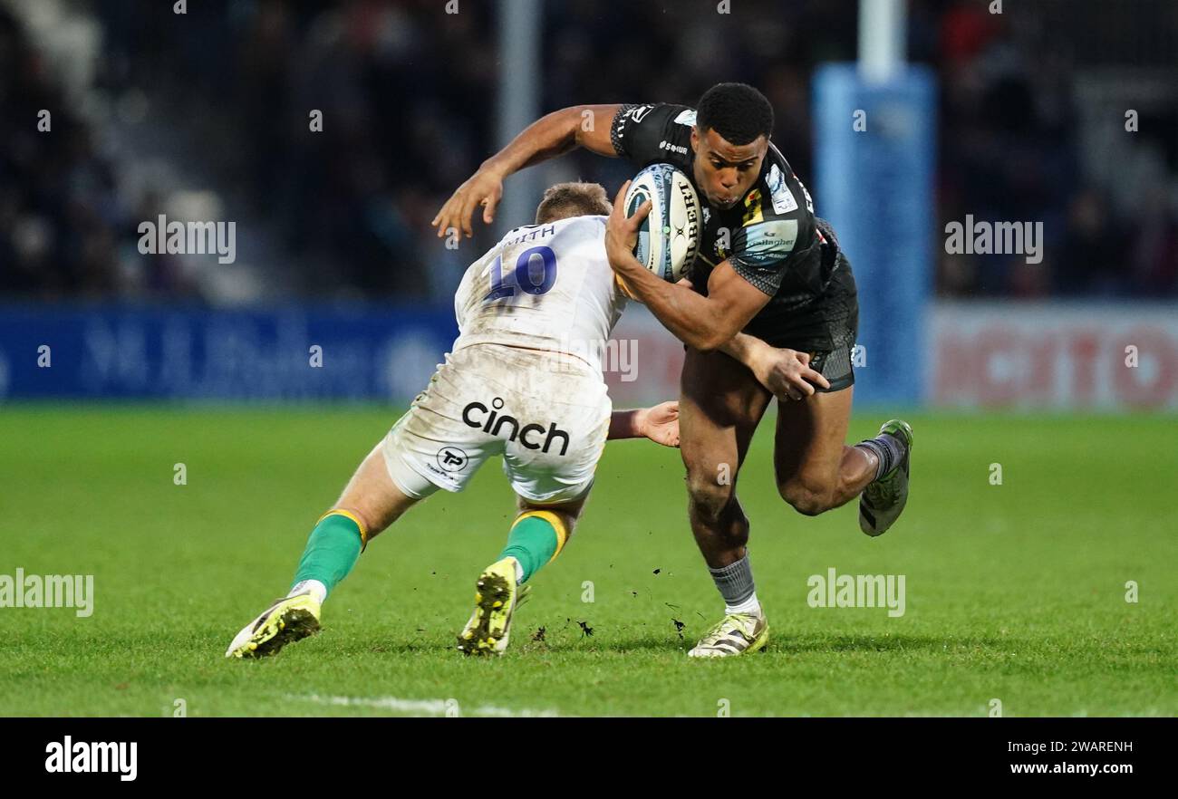 Exeter Chiefs Immanuel Feyi-Waboso is tackled by Northampton Saints Fin ...