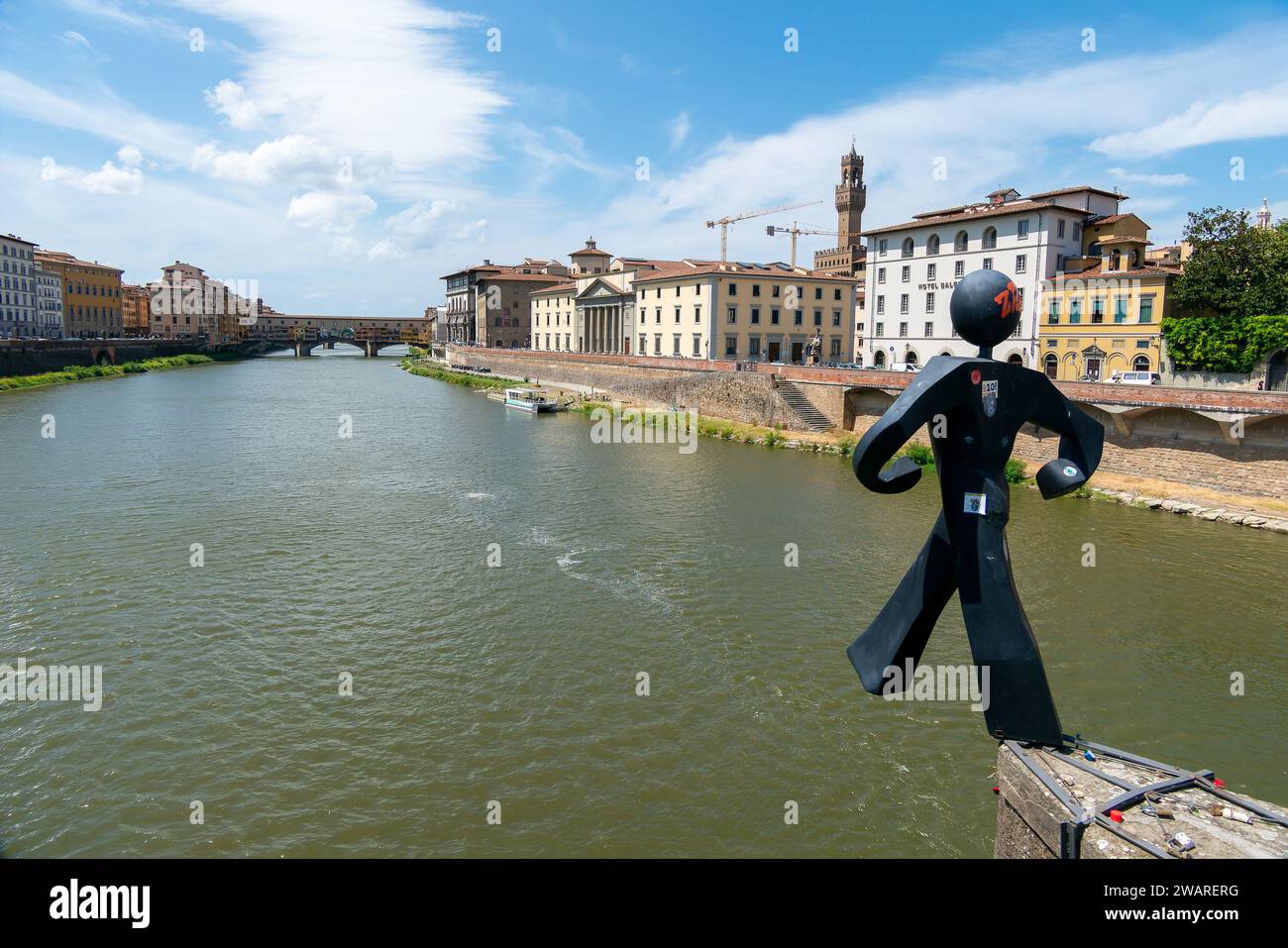Florence, Italy, July 25, 2023. The Common Man statue, Ponte alle ...