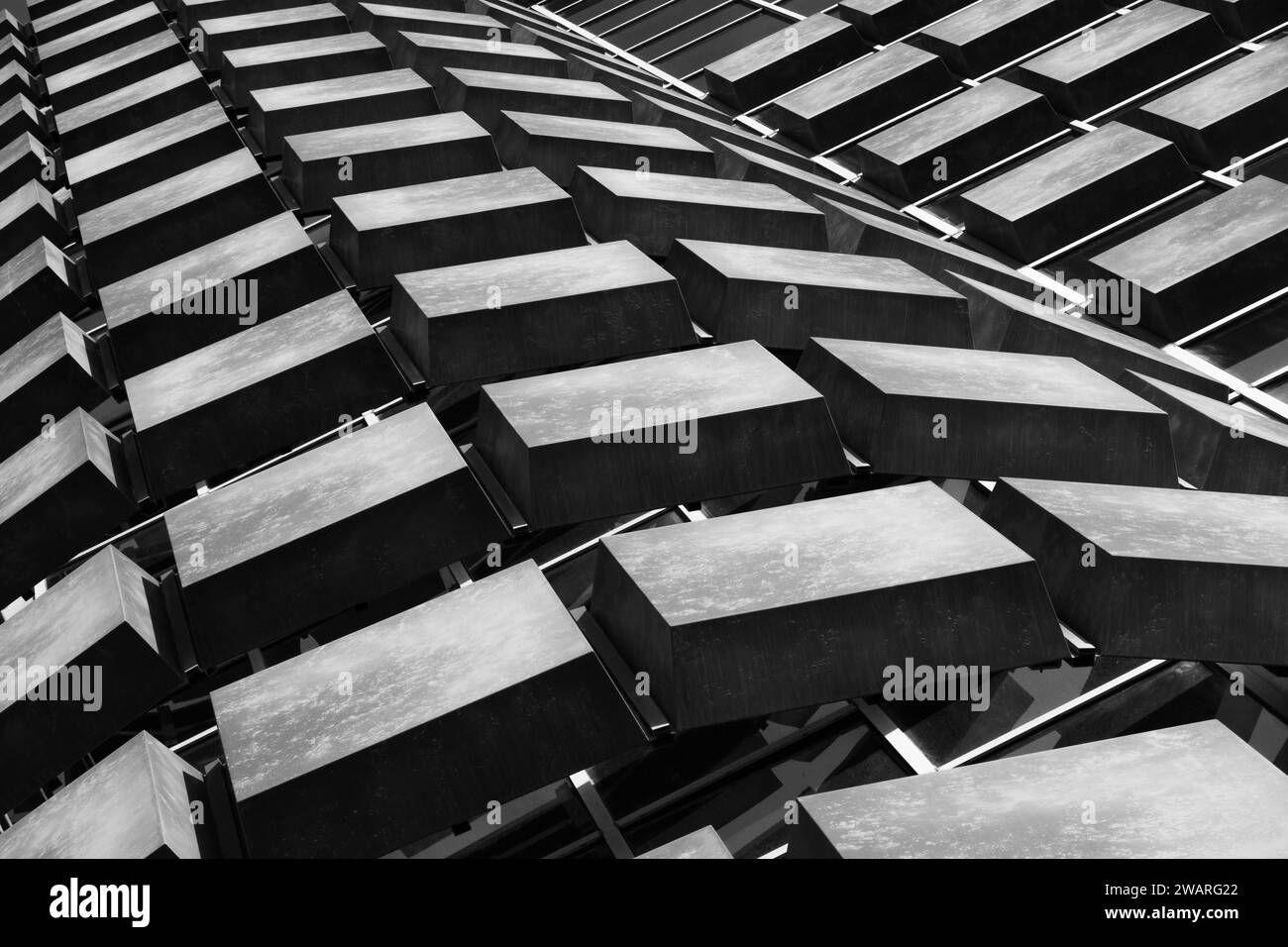 Monochromatic geometric pattern of building facade creating a dynamic ...