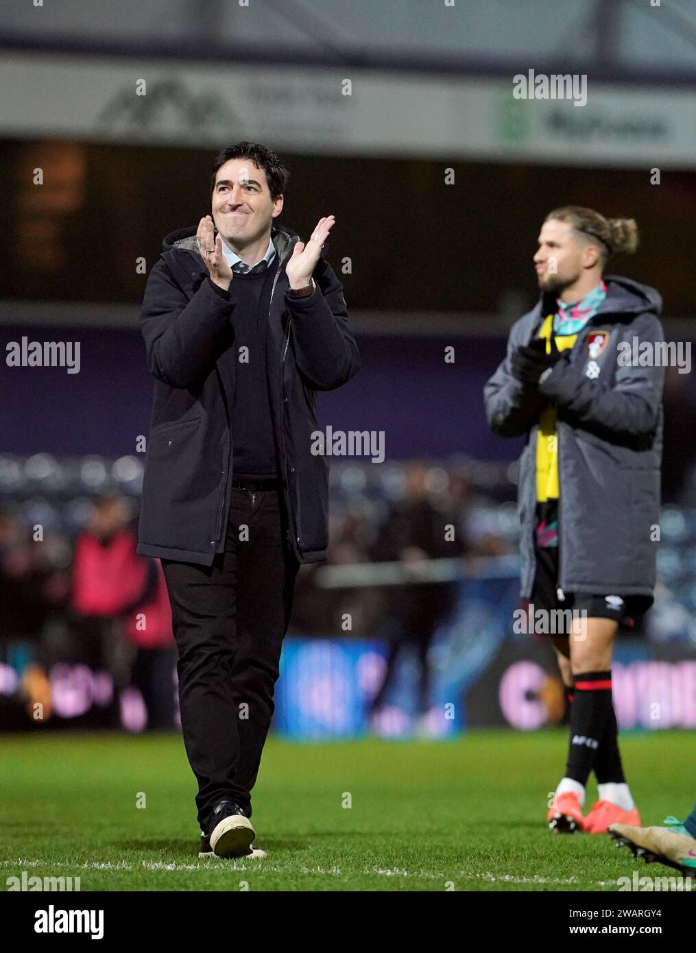 Bournemouth manager Andoni Iraola (left) applauds the fans after the ...